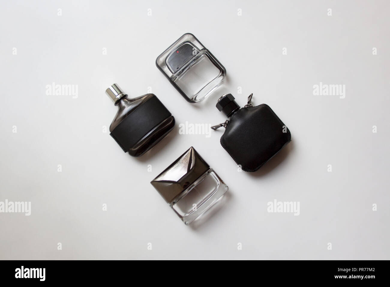 Four perfume bottles hi-res stock photography and images - Alamy