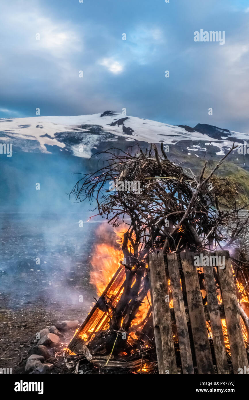 Ritual bonfire during the summer solstice in the midst of the surreal ...