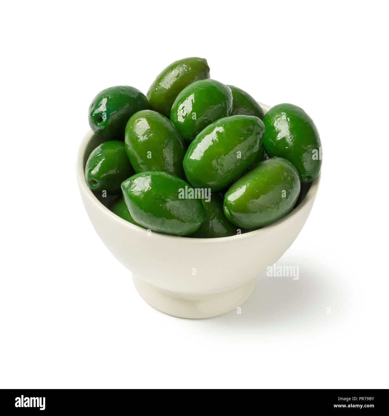 Single bowl with green Italan Bella olives isolated on white background ...