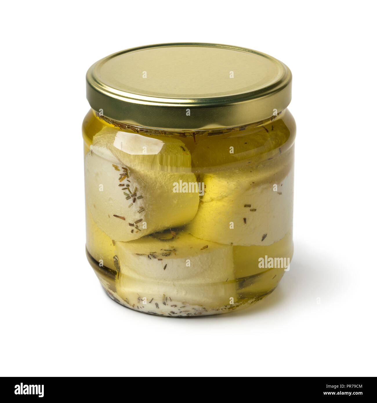 Glass jar with preserved white organic Dutch goat cheese and herbs ...