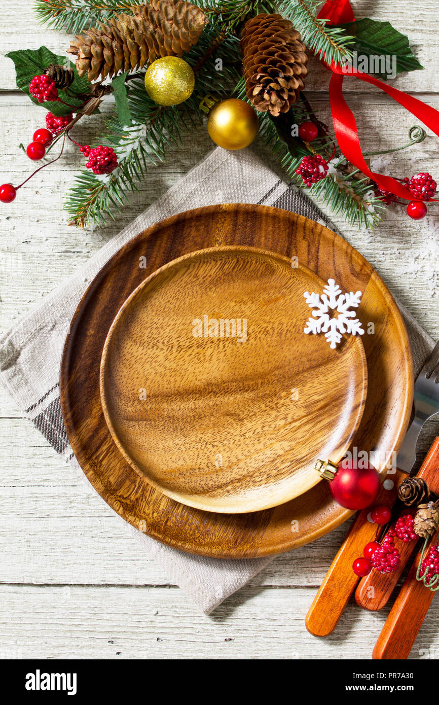 Festive table setting for holiday. Christmas decoration, plate and ...