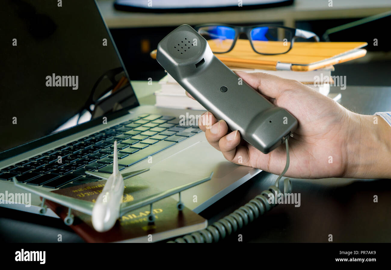 Travel agency operartor answering phone call for business travel Stock ...