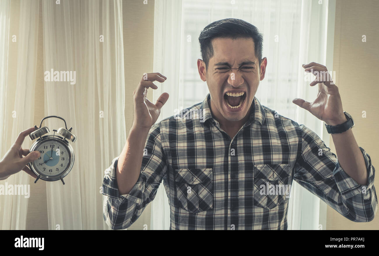 Man screaming alarm clock hi-res stock photography and images - Alamy
