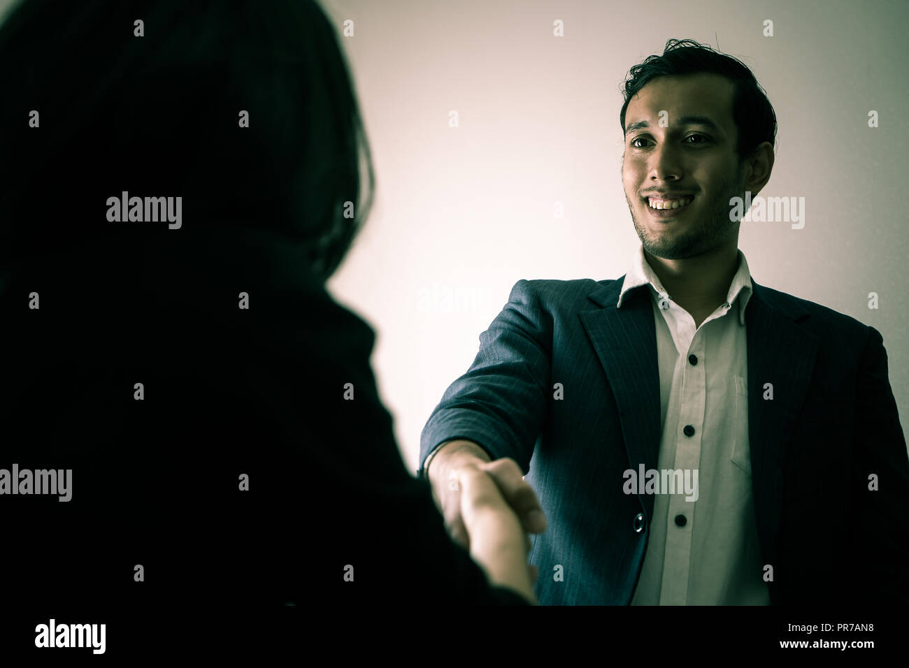 Handshake devil hi-res stock photography and images - Alamy