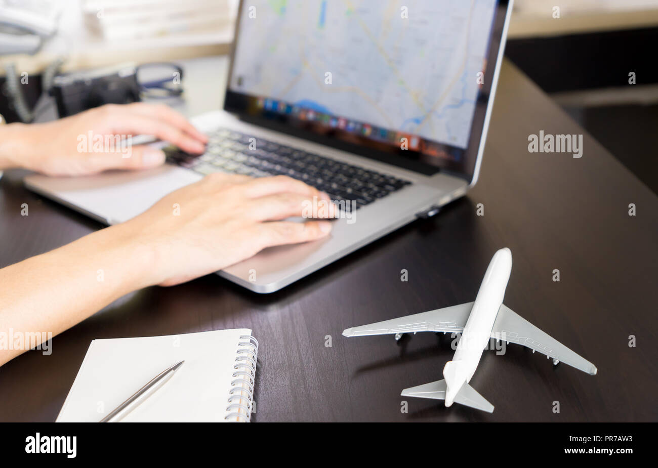 Planning vacation laptop map hi-res stock photography and images - Alamy
