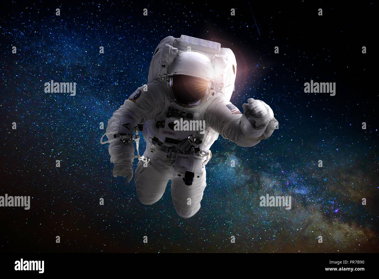 Astronaut or Spaceman floating in the space. Elements of this image ...