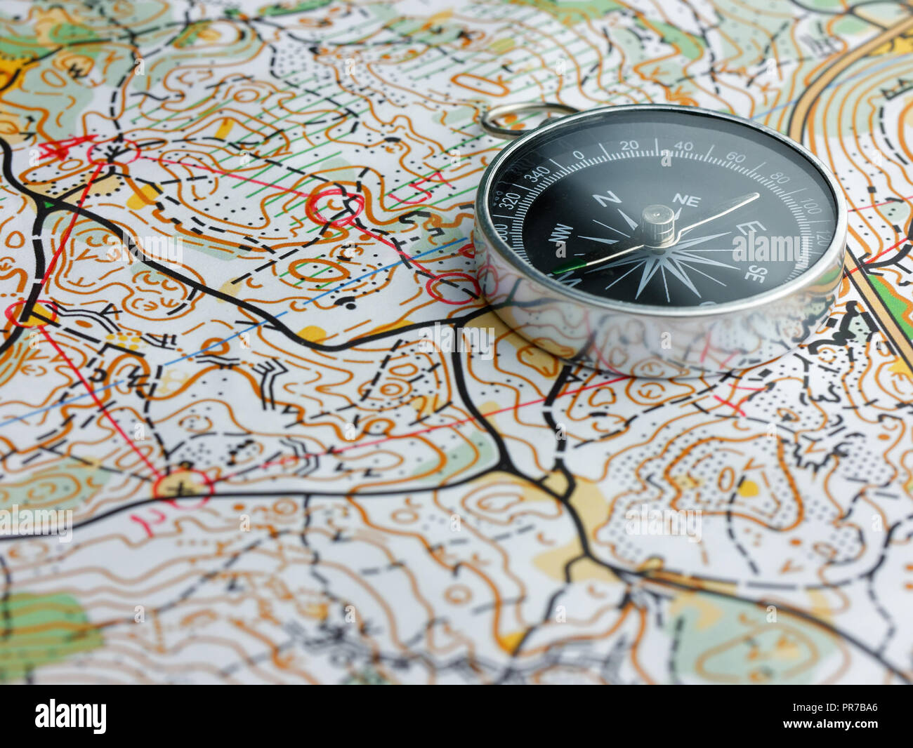 compass on orienteering map Stock Photo - Alamy