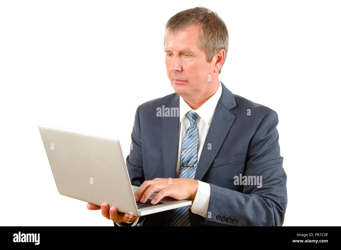 Software manager in suite with laptop in hands on white background ...