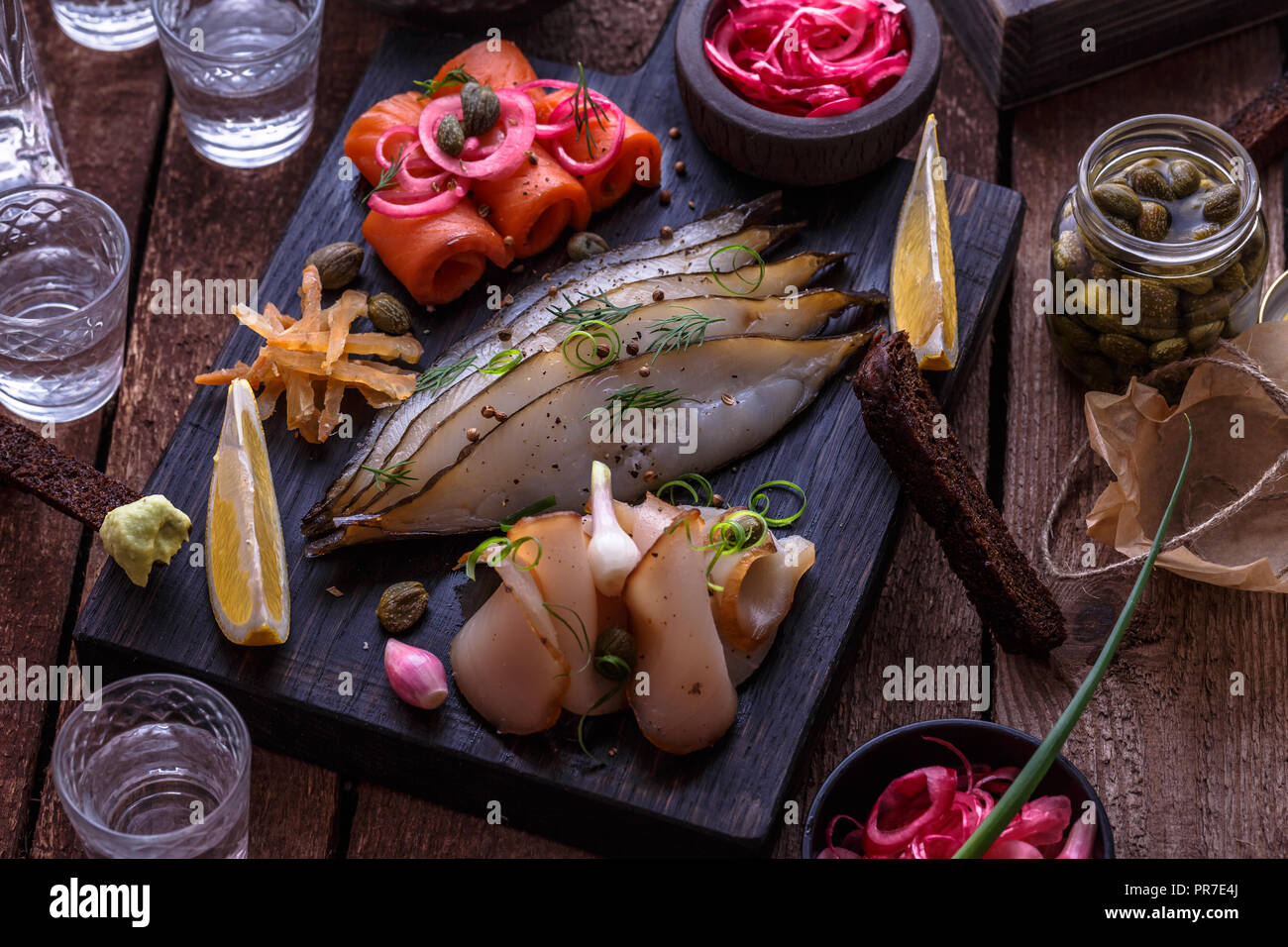 Fish appetizer for vodka shots, close view Stock Photo - Alamy