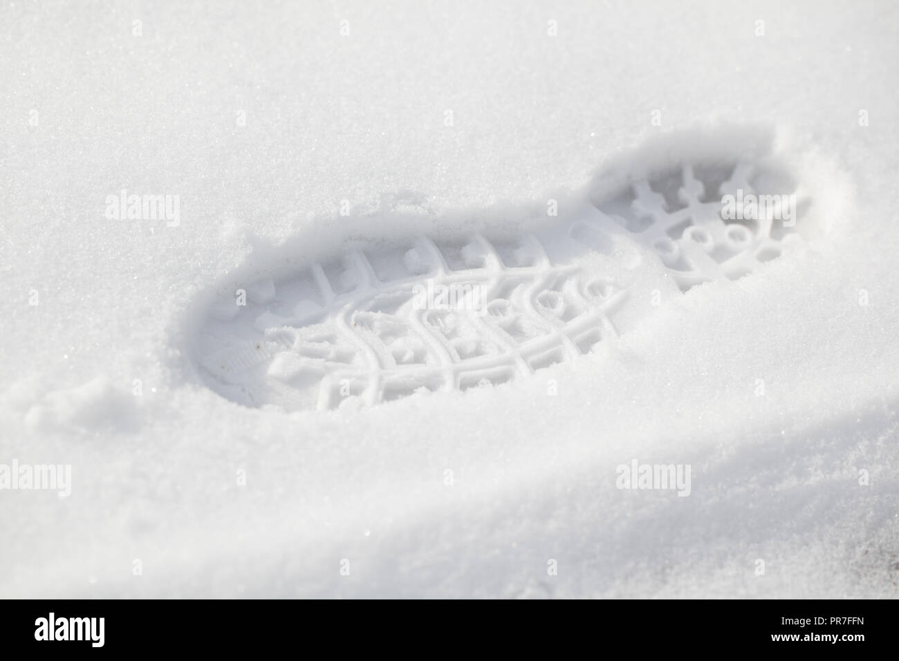 Boot trace on a fresh snow Stock Photo - Alamy