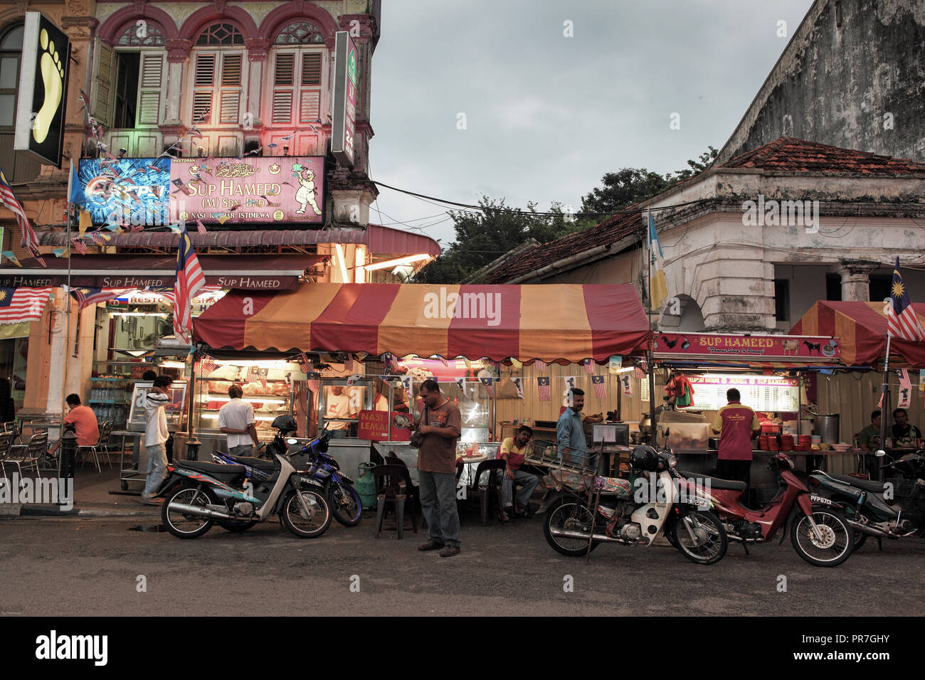 Dusk street scene in George Town, Penang, Malaysia Stock Photo - Alamy