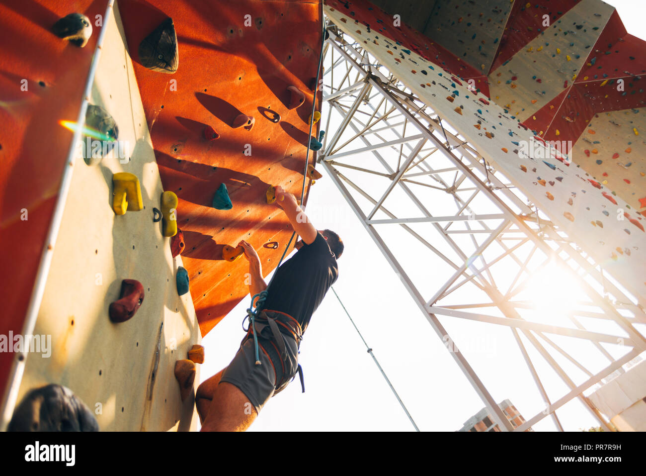 Active lifestyle and bouldering climbing, reaching the top concept ...