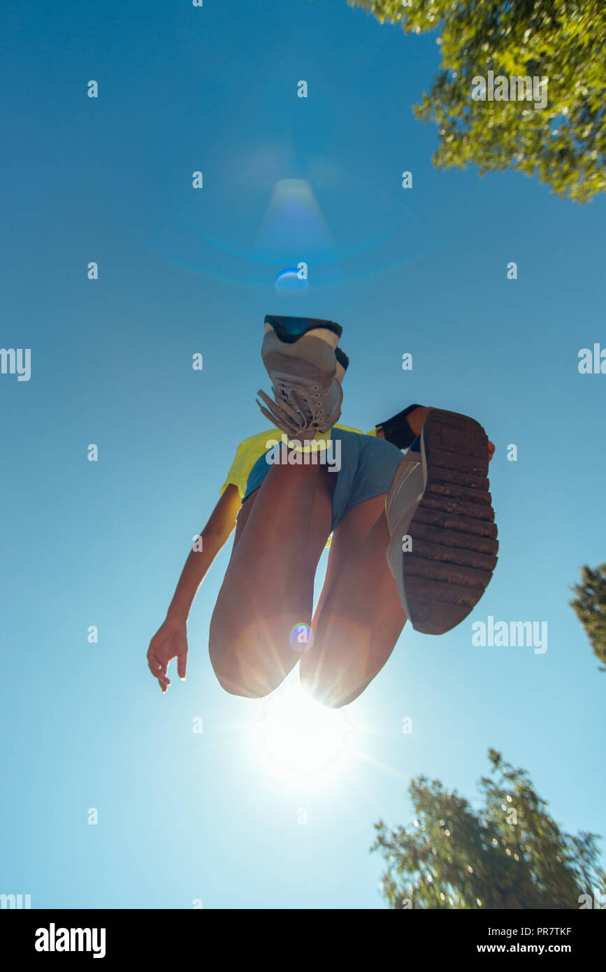 Young woman jogging upstairs in hi-res stock photography and images - Alamy