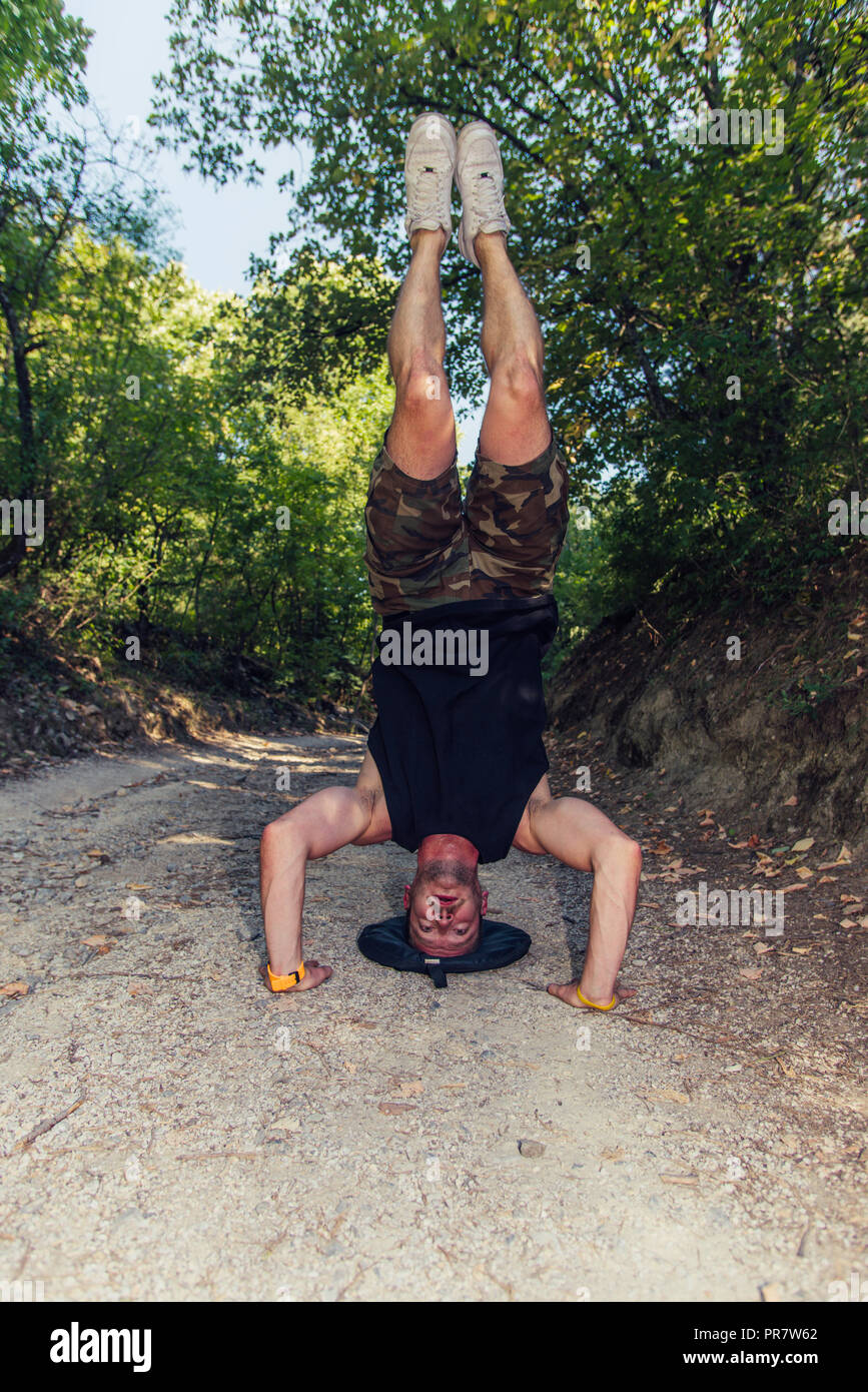 Tree woods handstand hi-res stock photography and images - Alamy