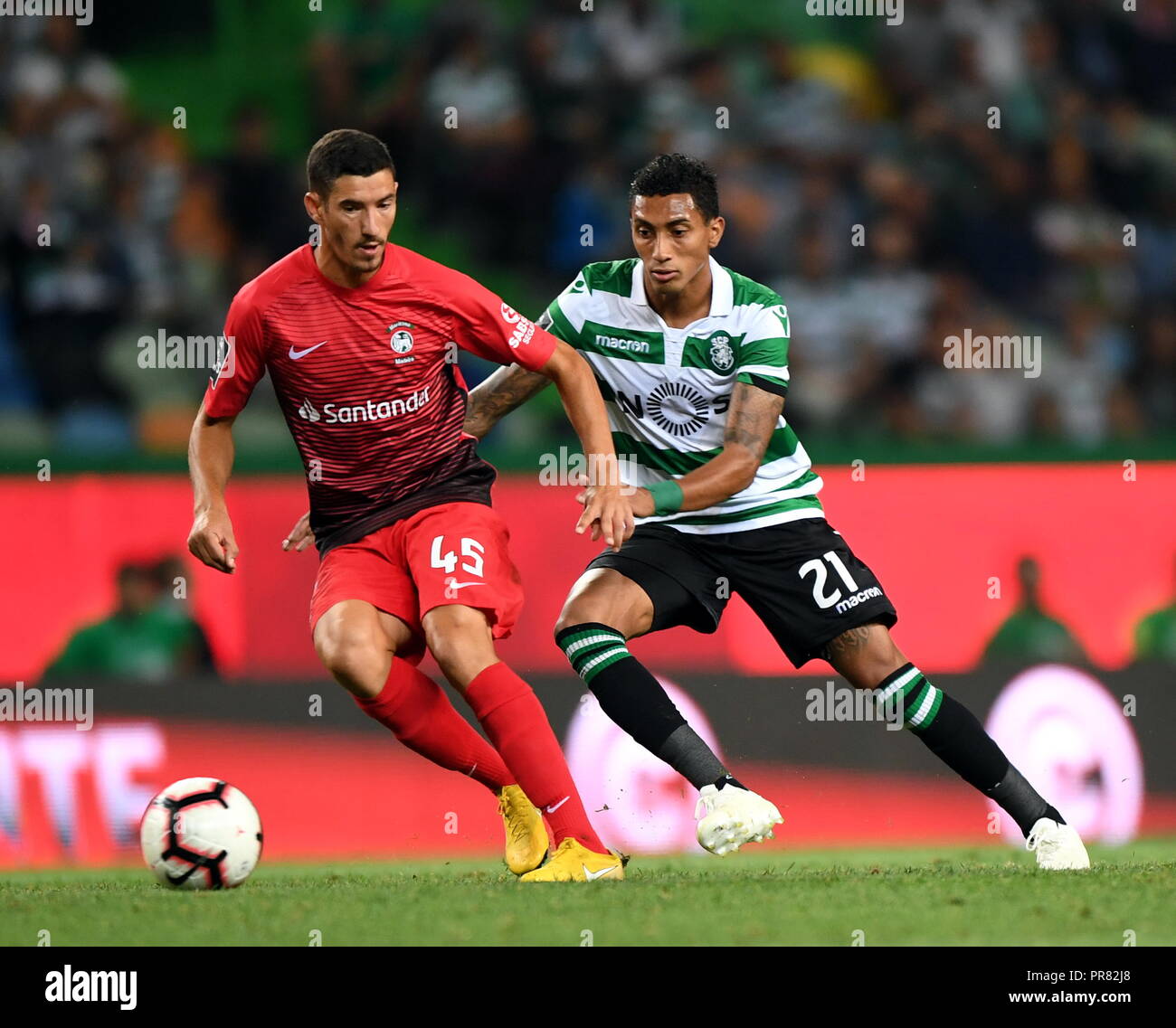 Lisbon, Portugal. 29th Sep, 2018. Raphinha (R) of Sporting vies with ...