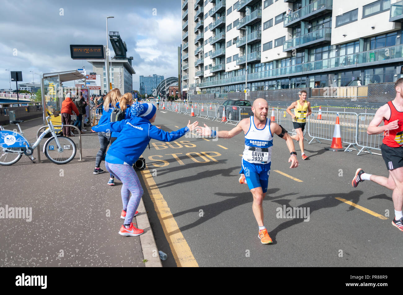 Glasgow, Scotland, UK. 30th September, 2018. A female spectator gives a ...