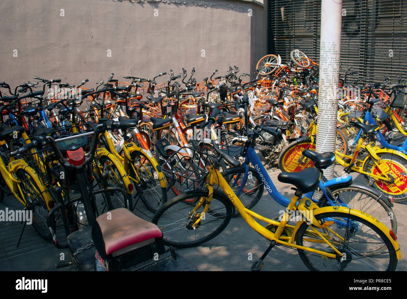 Rental bikes on a sidewalk in Beijing, China Stock Photo - Alamy