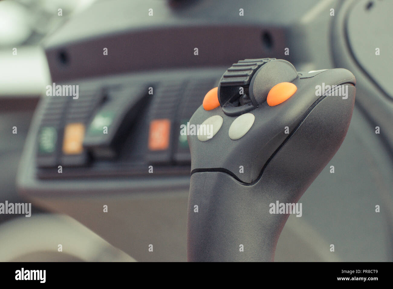 Closeup of operating control panel with buttons in truck, agricultural ...