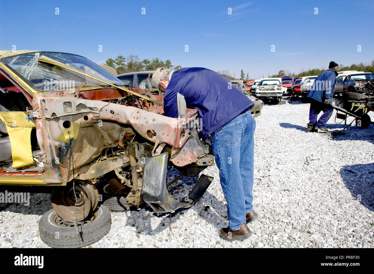 Mechanic with wrecked engine hi-res stock photography and images - Alamy