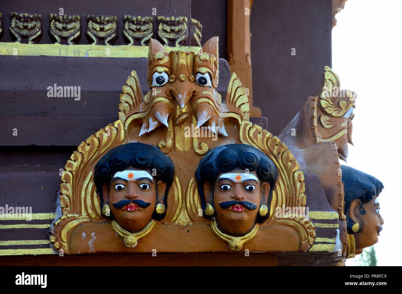 Two face head holy deity wood carving at Nallur Kandaswamy Hindu temple ...