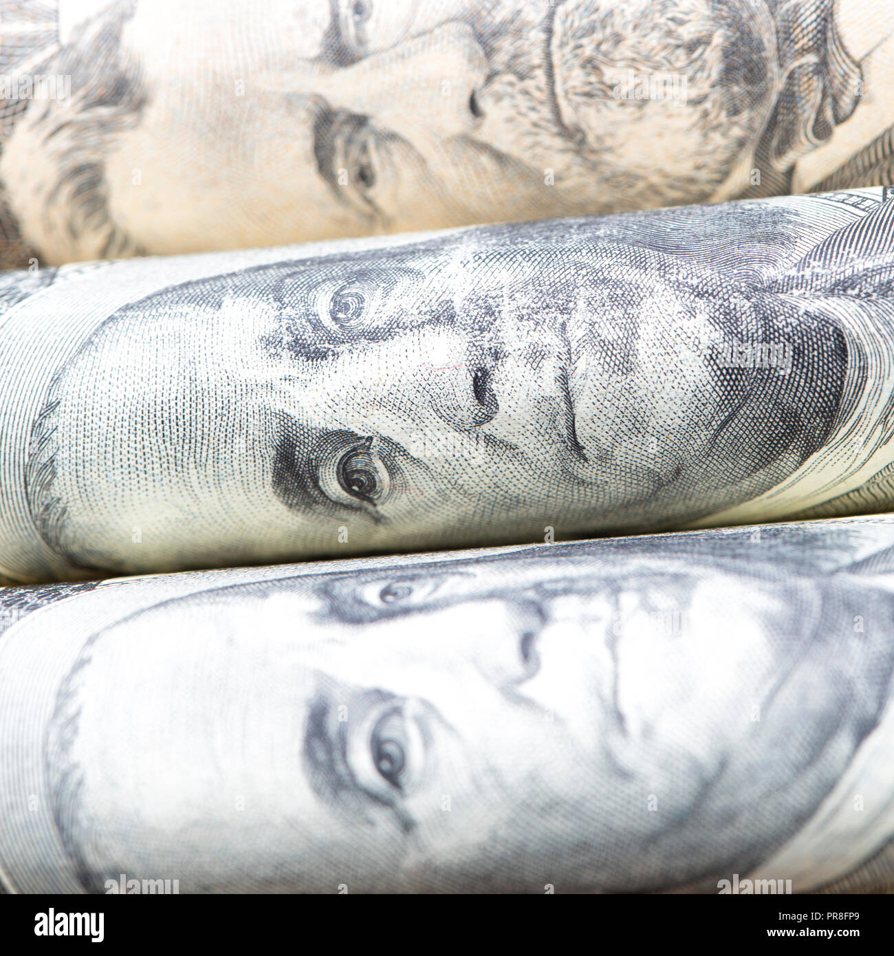 blurred dollars banknote rolled up and close up concept of economy ...