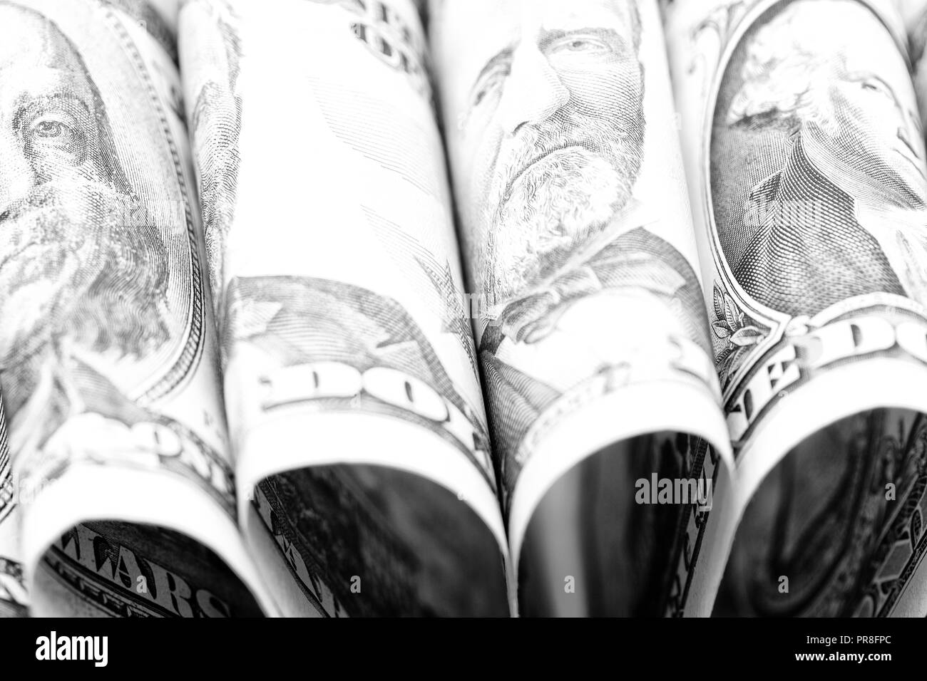 Rolled up dollar bill Black and White Stock Photos & Images - Alamy