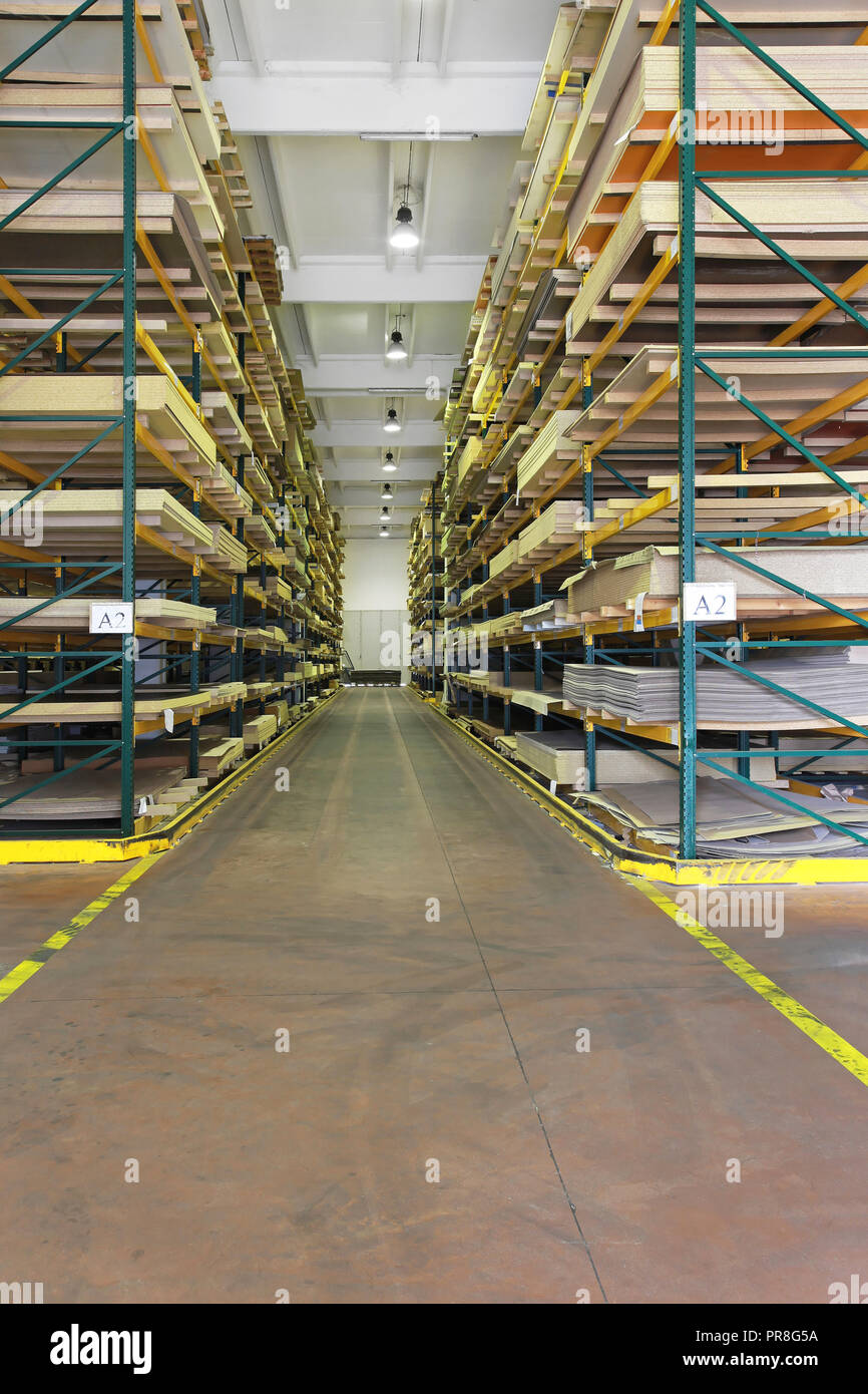 Corridor with shelves in warehouse for building materials Stock Photo ...
