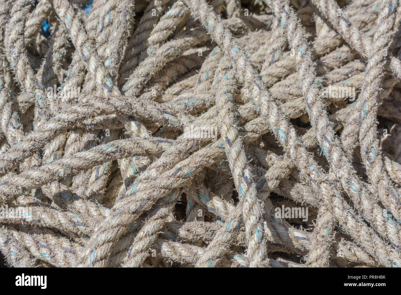 Harbour scenes around Newquay, Cornwall. Coiled commercial marine rope ...