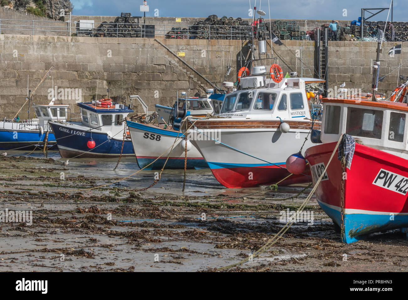 Harbour scenes around Newquay, Cornwall. Boat mooring chained visible ...