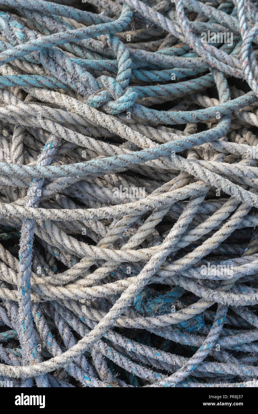 Harbour scenes around Newquay, Cornwall. Coiled commercial marine rope ...