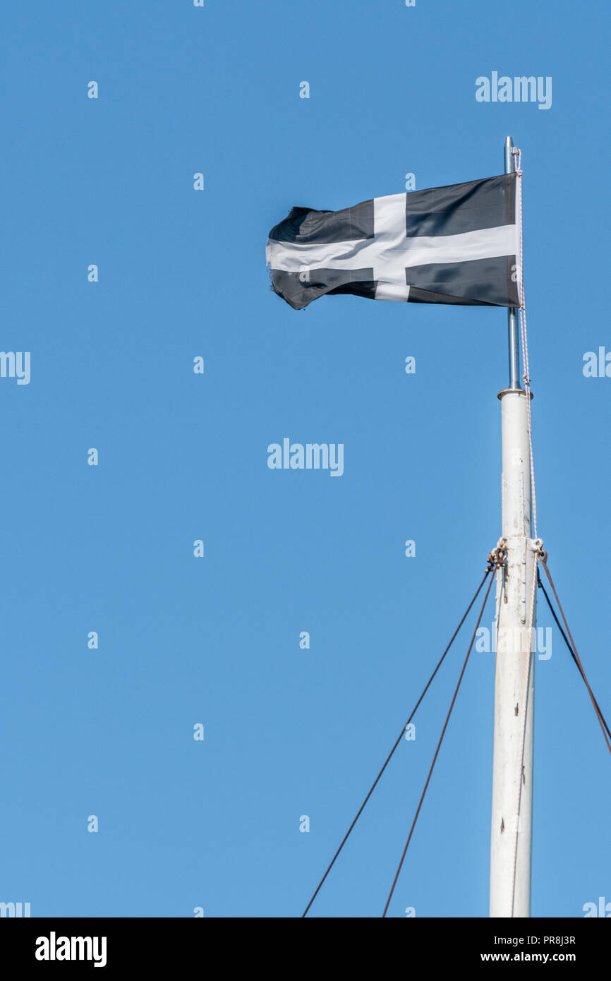 Harbour scenes around Newquay, Cornwall. Cornish flag flying down by ...
