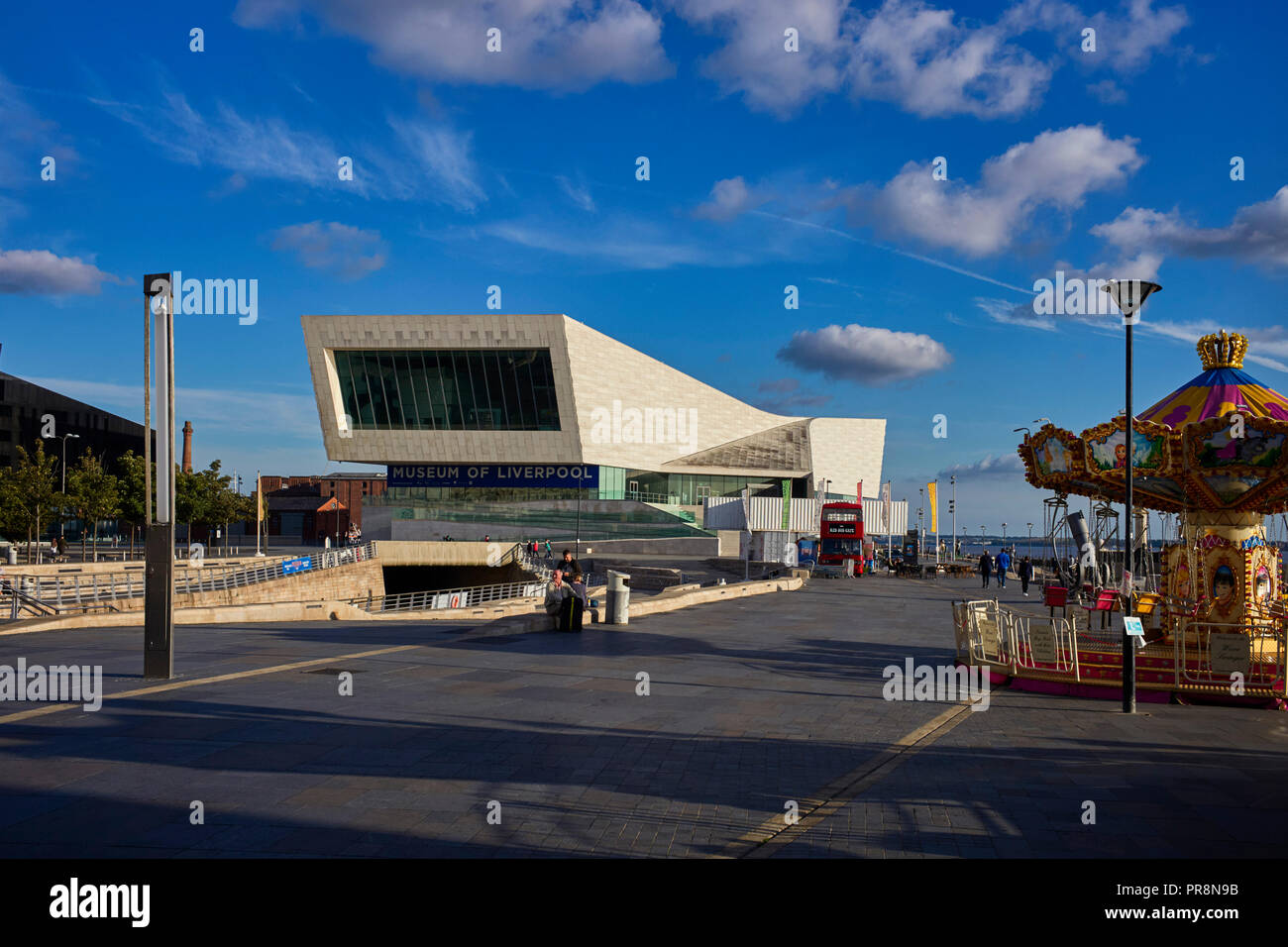 Evening sunlight at Pier Head Liverpool with the Museum of Liverpool in ...