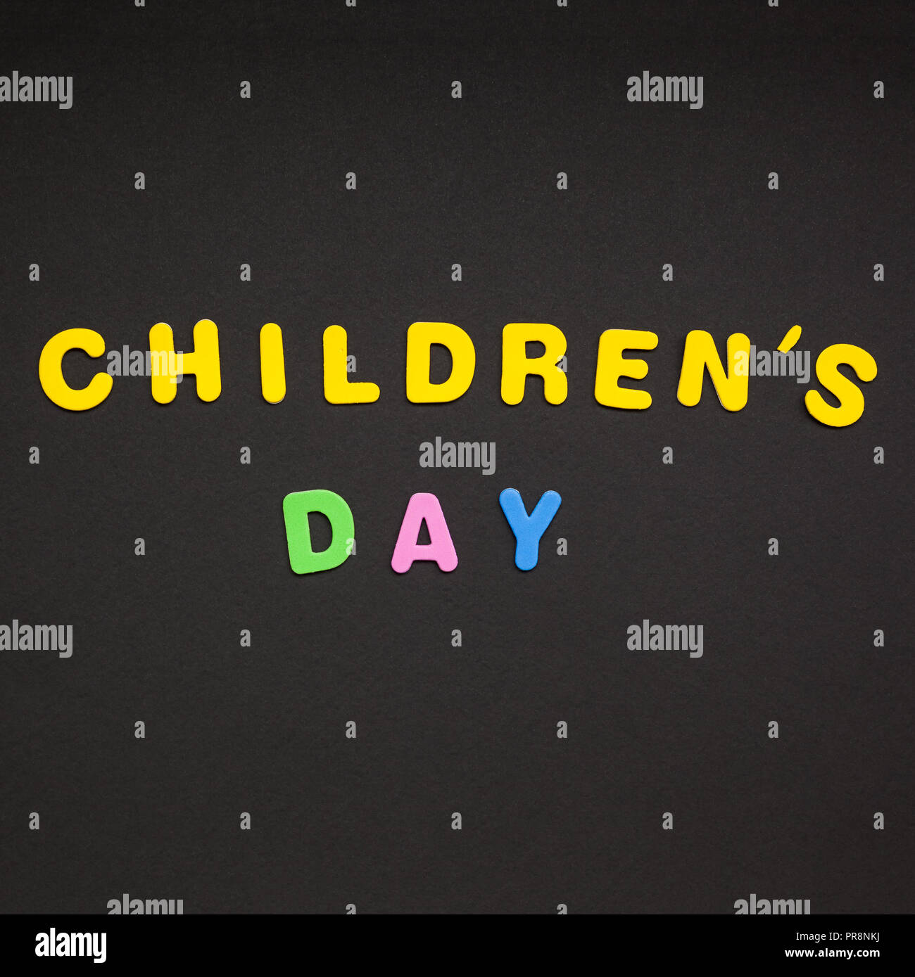 Creative colorful text made from plastic letters Children's day writing ...