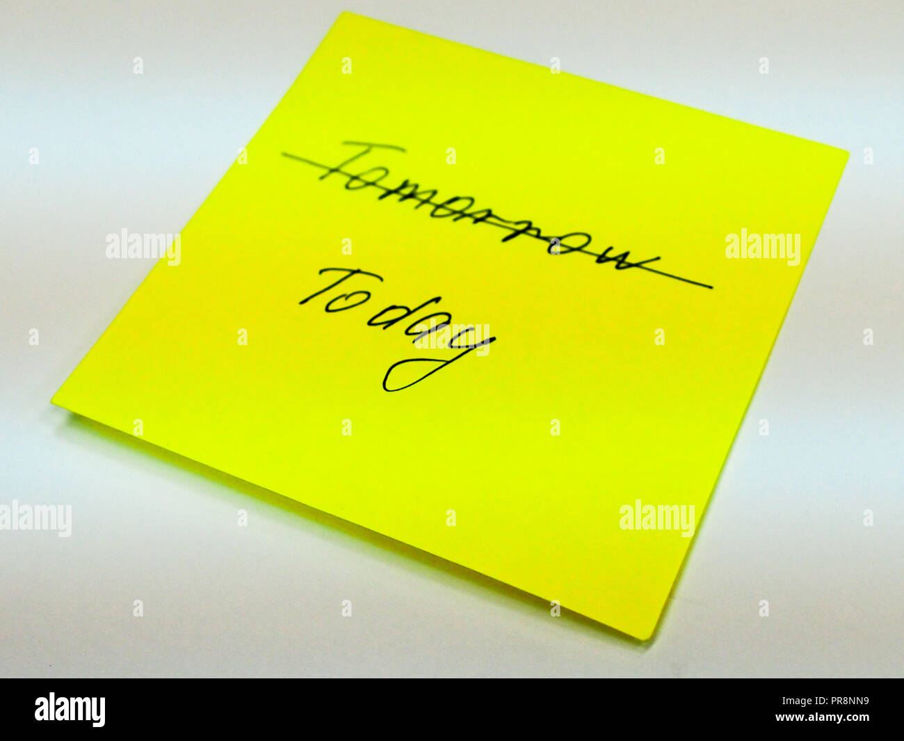Sticky note with text today and tomorrow Stock Photo - Alamy