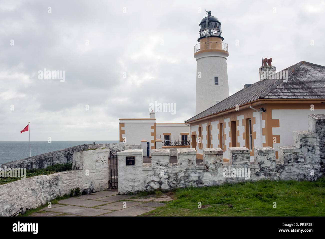 Lighthouse and tower, Douglas Head, Isle of Man on a cloudy day Stock ...