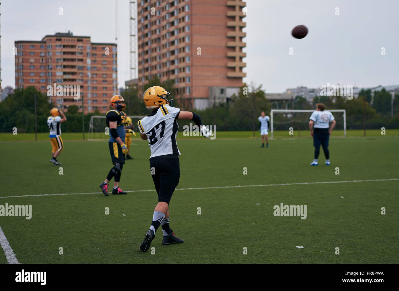 Male playing football stadium hi-res stock photography and images - Alamy