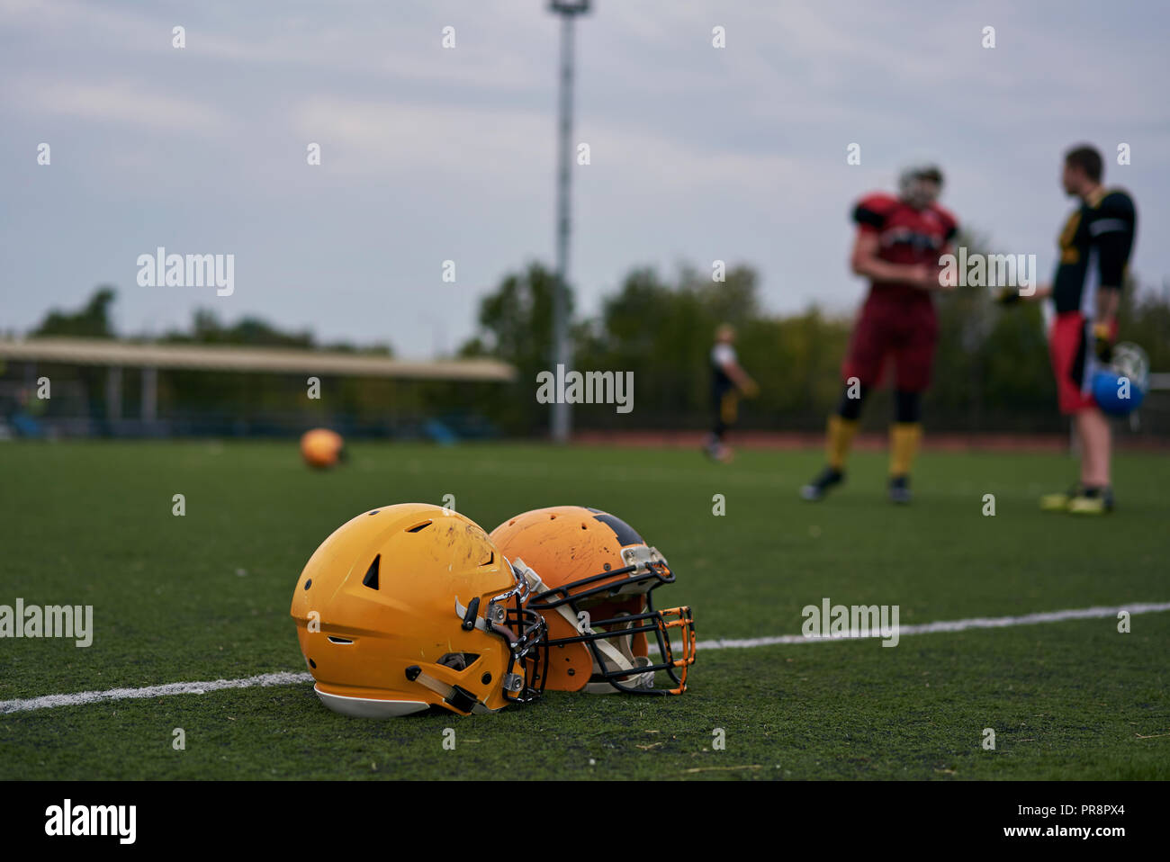 Male playing football stadium hi-res stock photography and images - Alamy