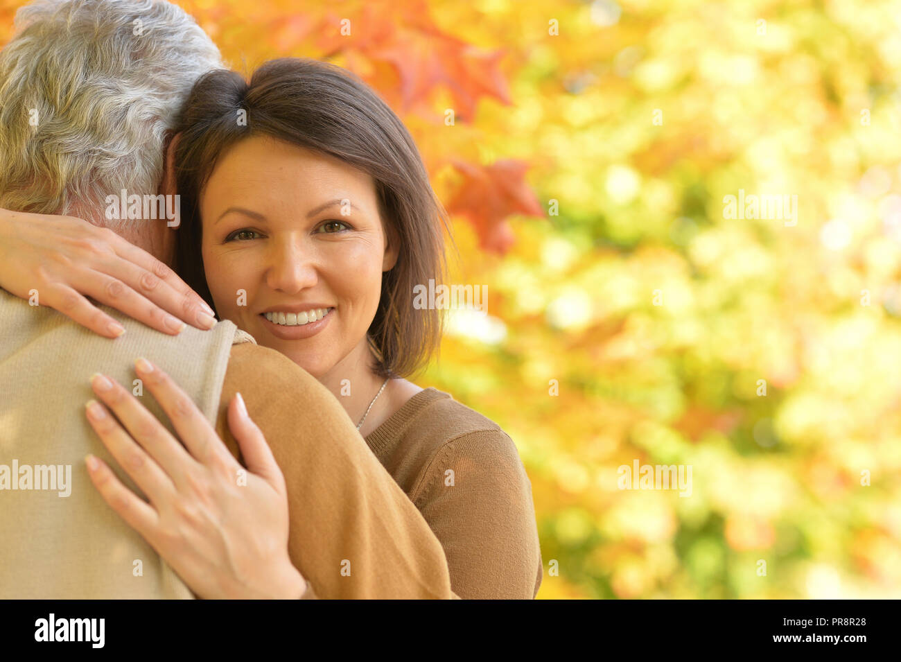 Attractive man woman posing hi-res stock photography and images - Alamy