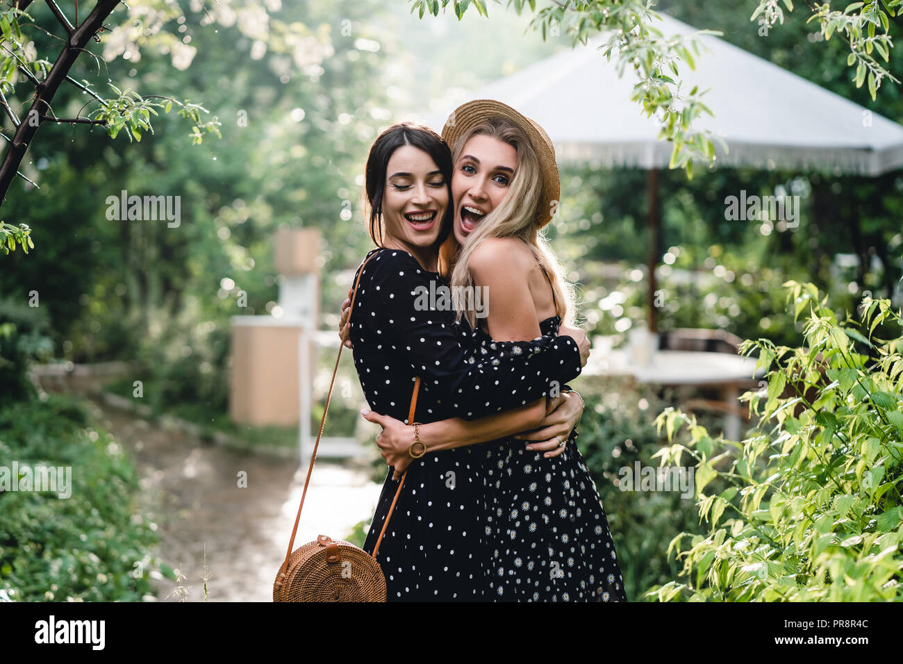 Two girls in a summer park Stock Photo - Alamy