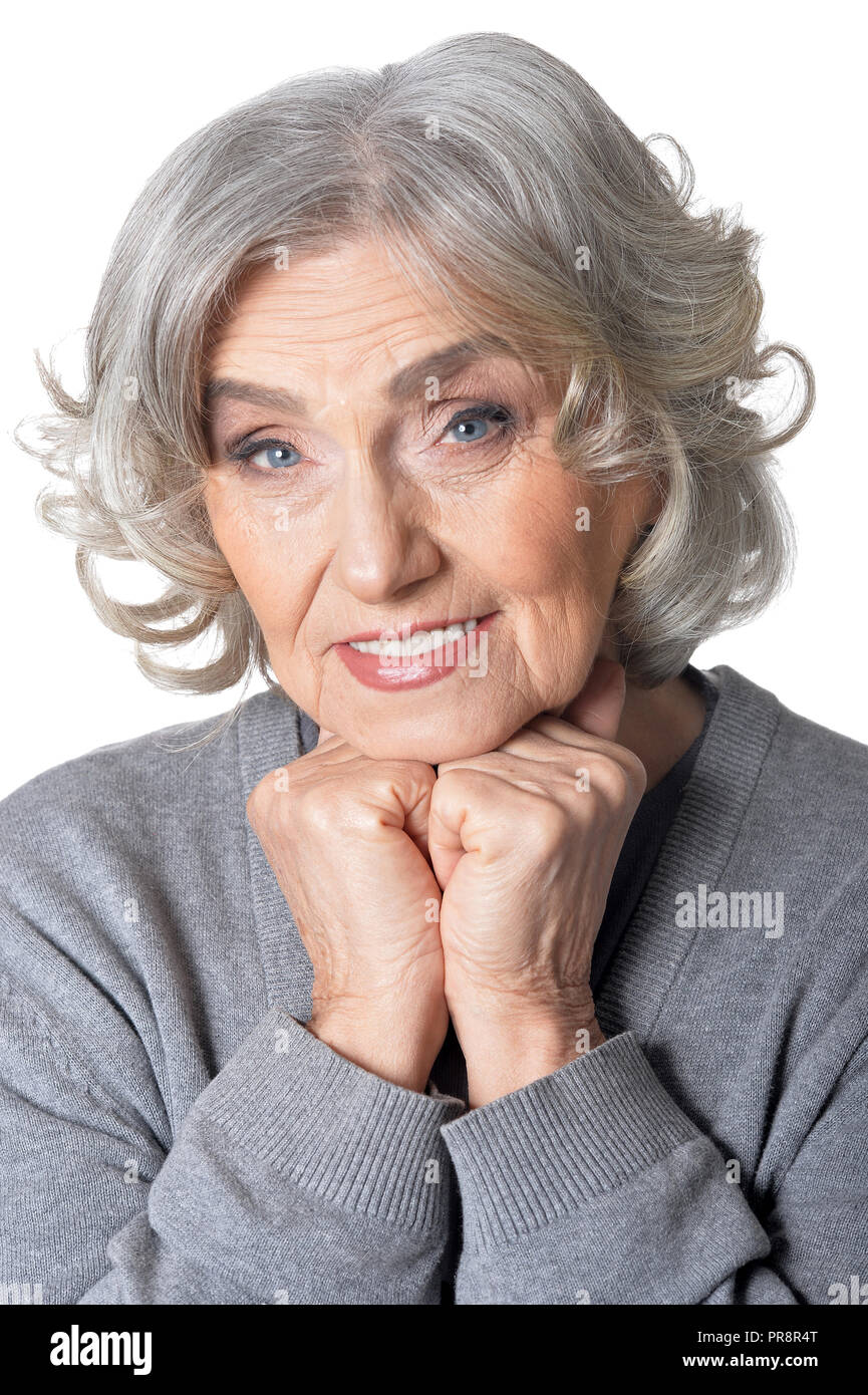 Portrait of beautiful senior woman posing on white background Stock ...