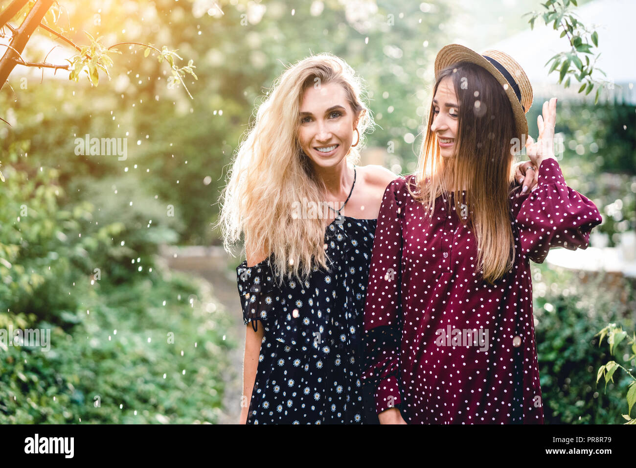 Two girls in a summer park Stock Photo - Alamy