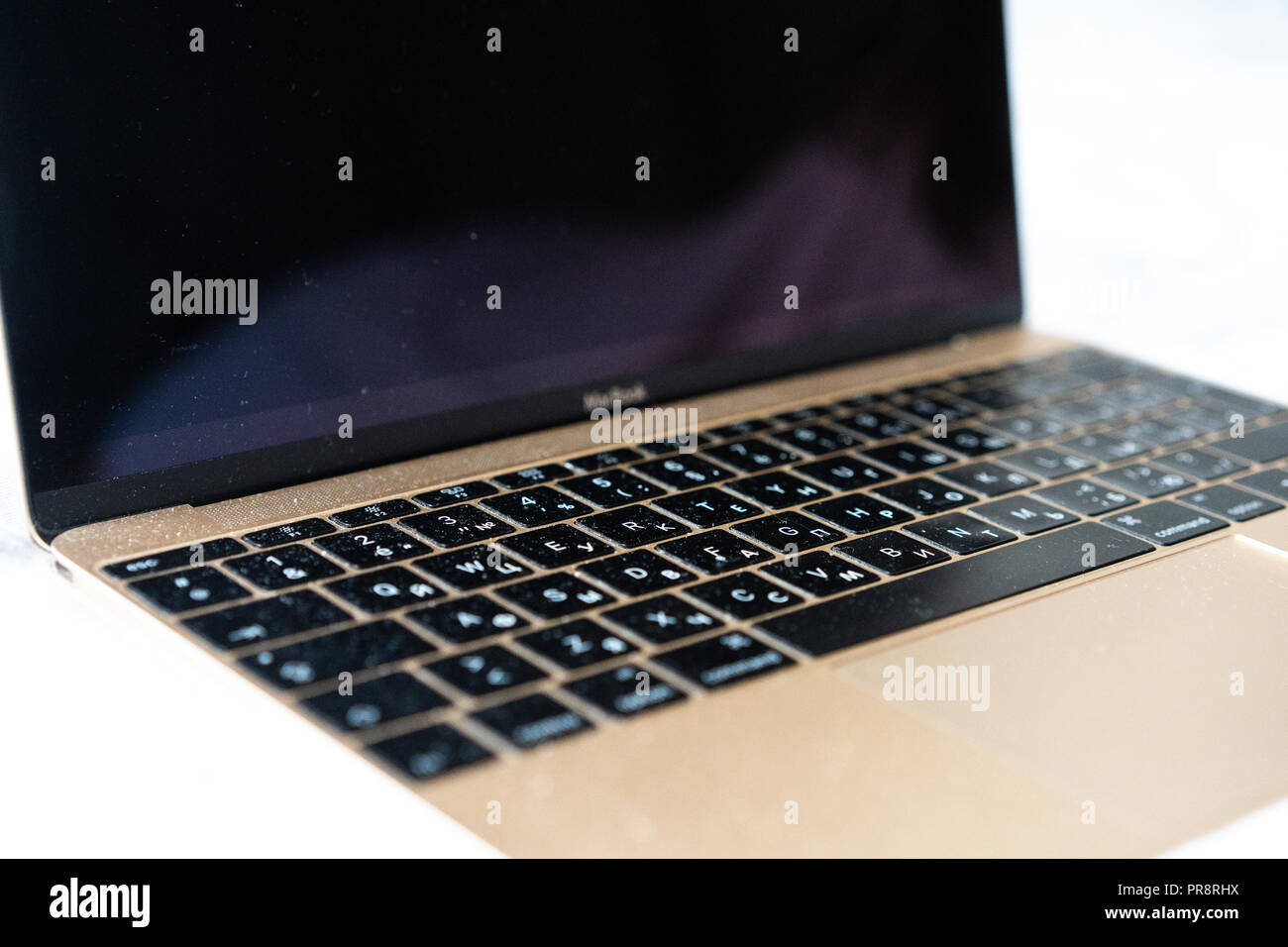Photo of an open laptop from a close angle Stock Photo - Alamy