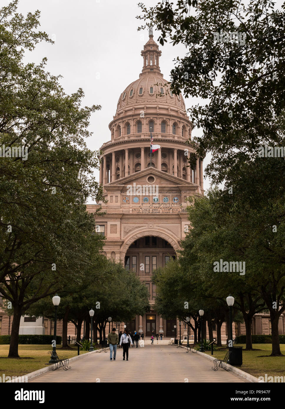 AUSTIN, TEXAS - DECEMBER 31, 2017: People can be seen walking and ...