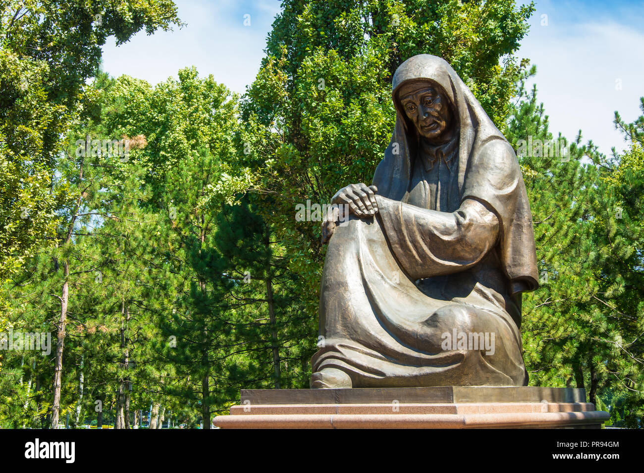 Monument grieving woman in Memorial Square of Memory in Tashkent ...