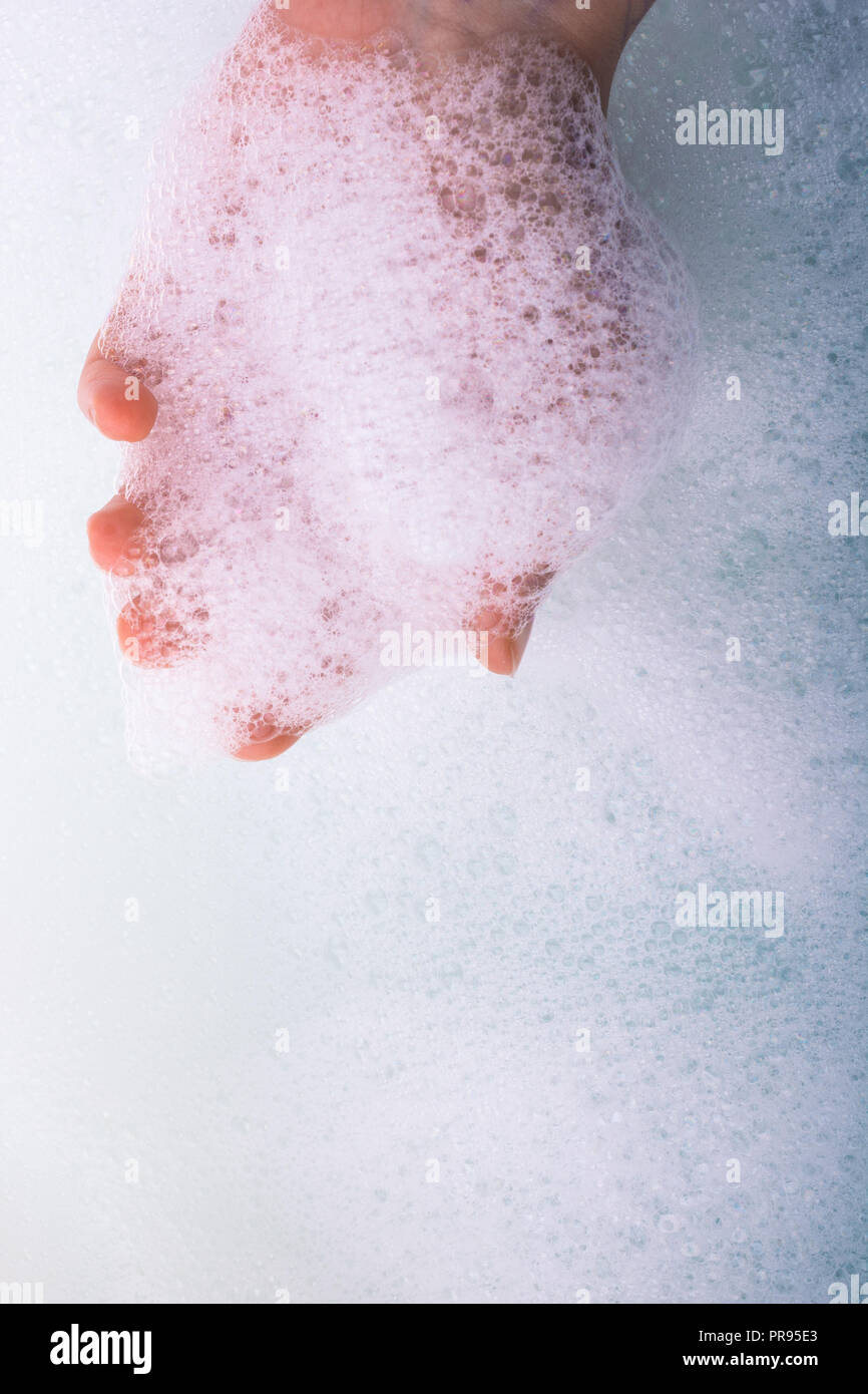 Hand washing and soap foam on a foamy background Stock Photo - Alamy