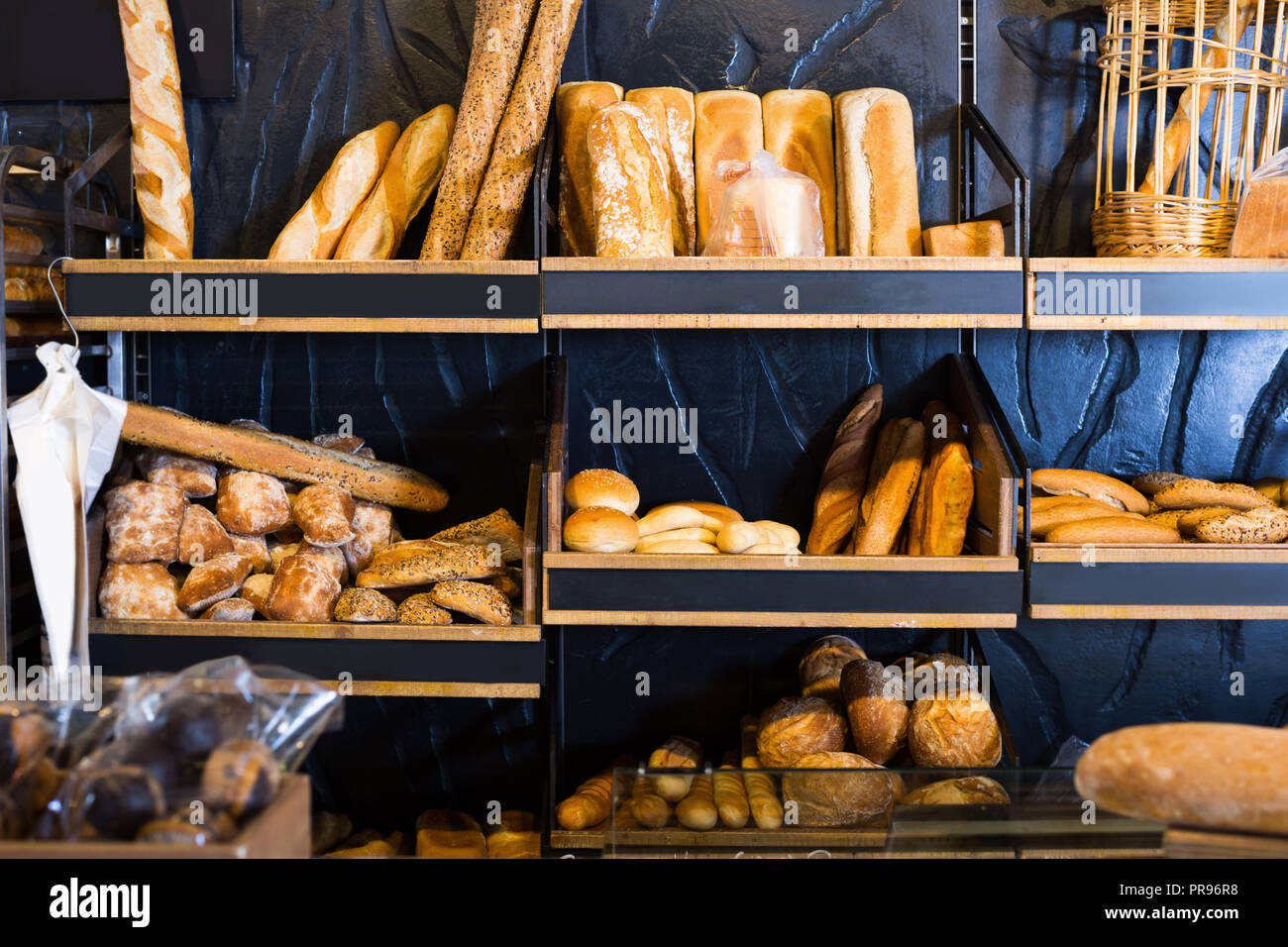 bakery shop with assortment of bread on shelves Stock Photo - Alamy