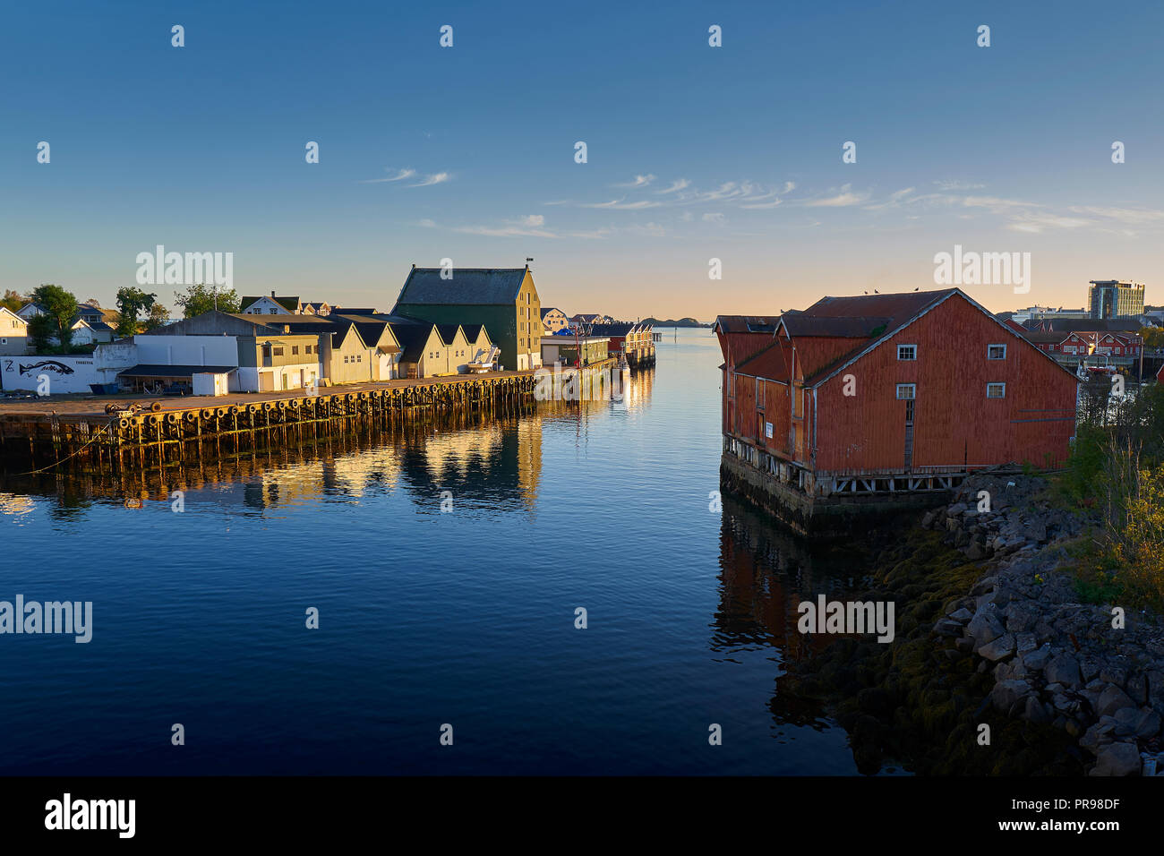 Old Norwegian Fishing Warehouses On The Waterfront At Kjeøya To The ...
