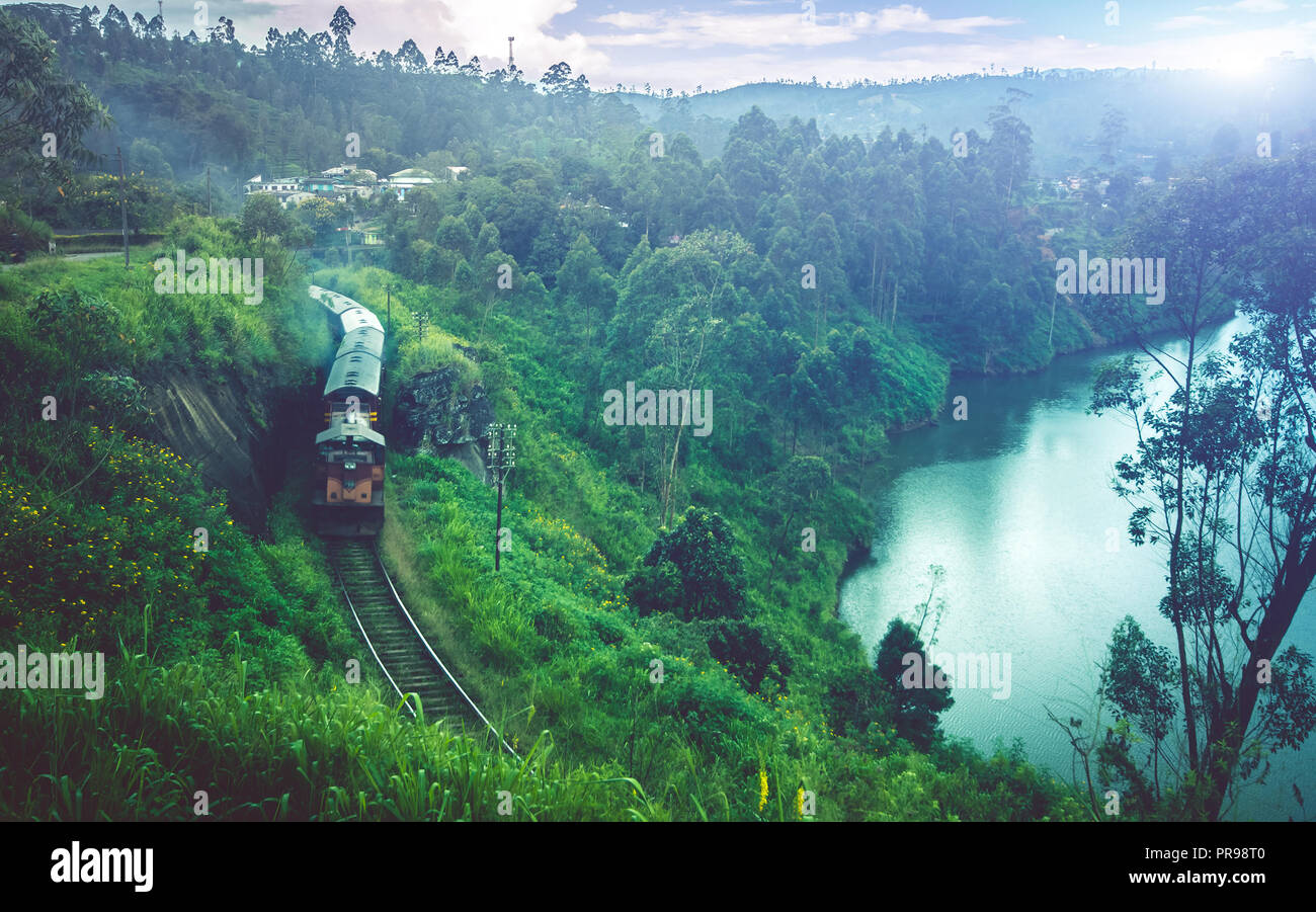 Train over Ihala Kotmale reservoir at Thalawakele in Sri Lanka Stock ...
