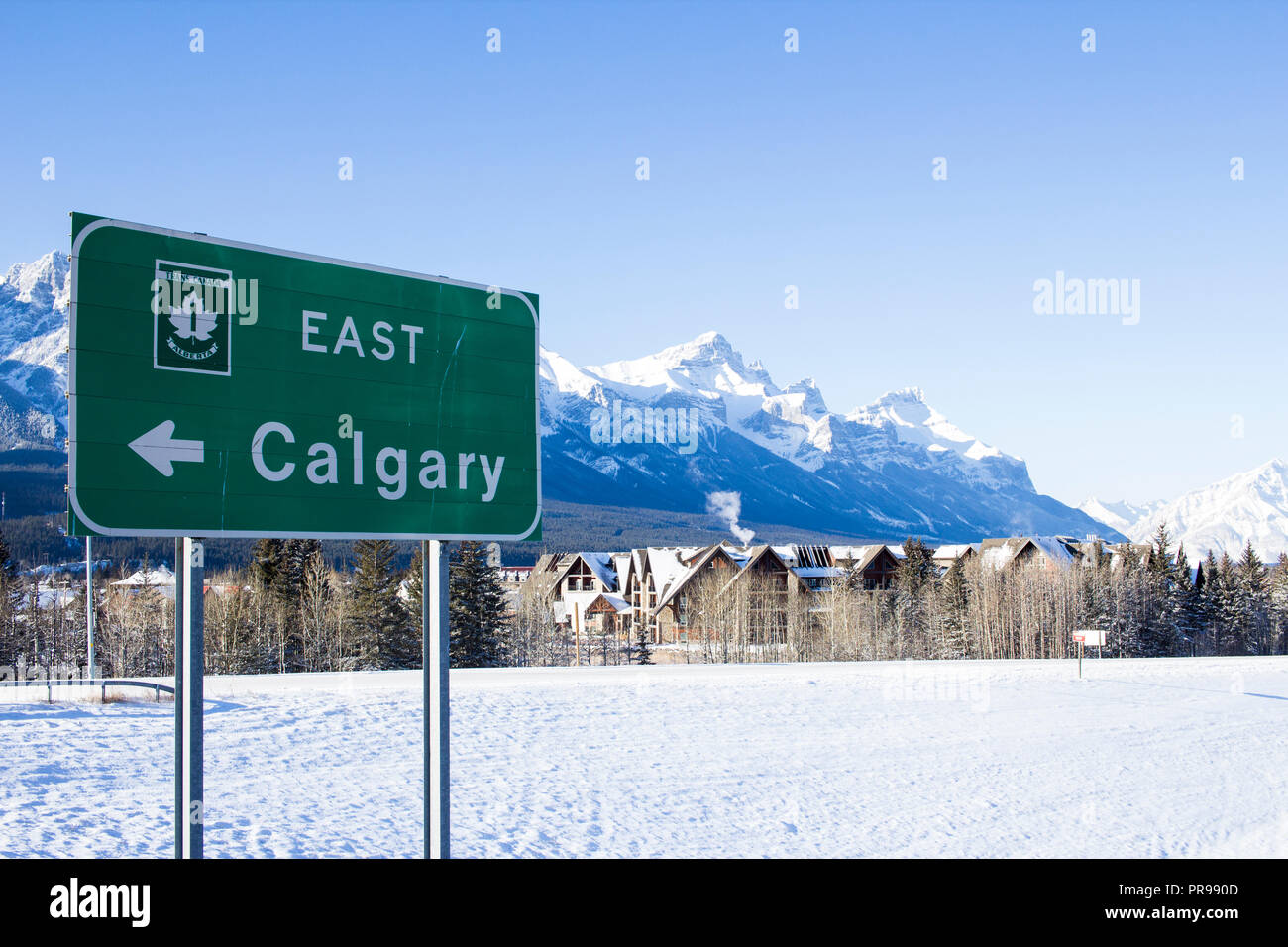 A highway sign is pointing left to Calgary along the trans Canada ...