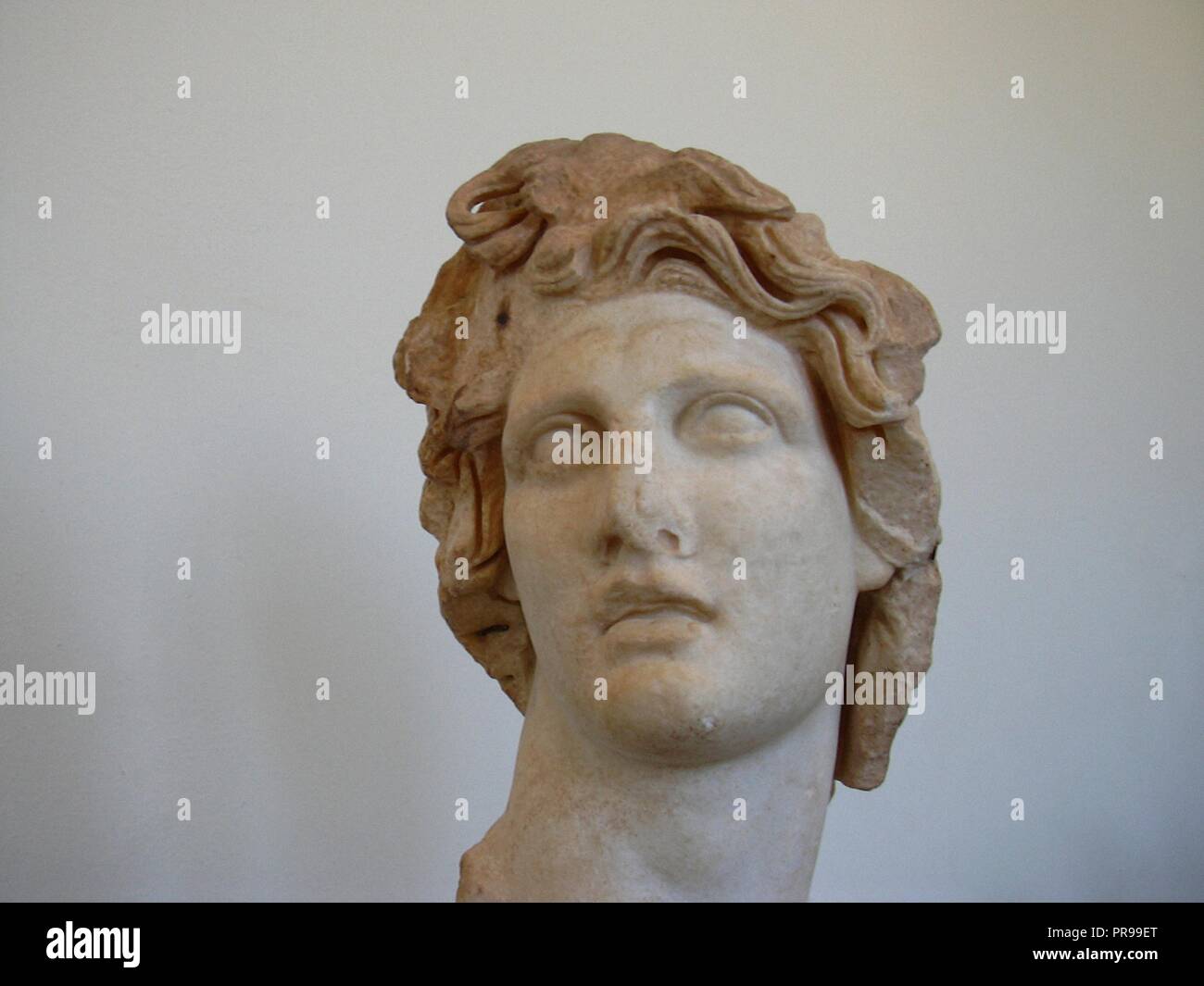 Head of Helios at archaeological Museum of Rhodes Greece Stock Photo ...